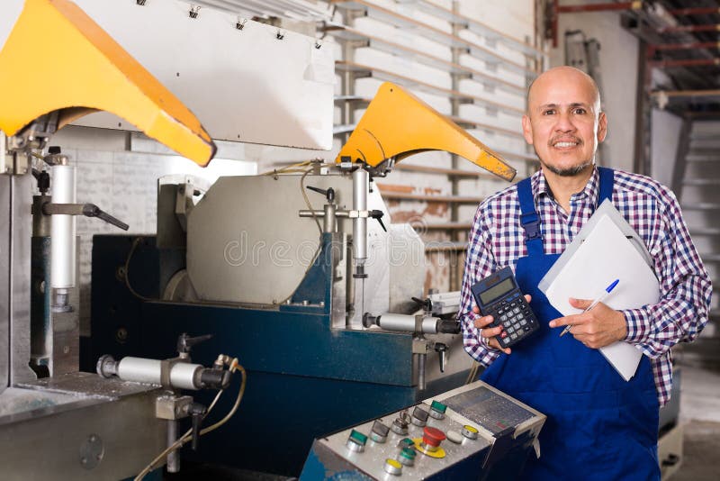 Guy at professional lathe stock image. Image of workman - 242560973