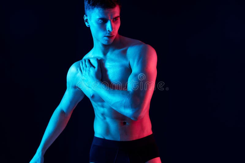 Guy with Pumped Up Torso and Neon Light Isolated Background Stock Image ...