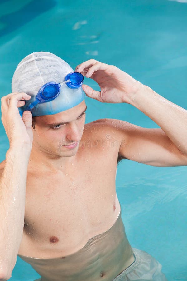 Guy putting on goggles stock image. Image of calm, hydrotherapy - 65088349