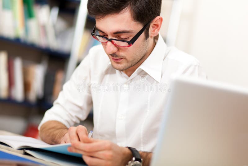 Guy reading a book stock photo. Image of read, teenager - 30287450