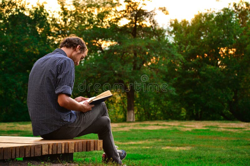 Guy reading book stock image. Image of poem, blue, portrait - 59423097
