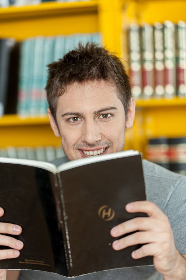 Guy reading a book stock image. Image of person, property - 73373203