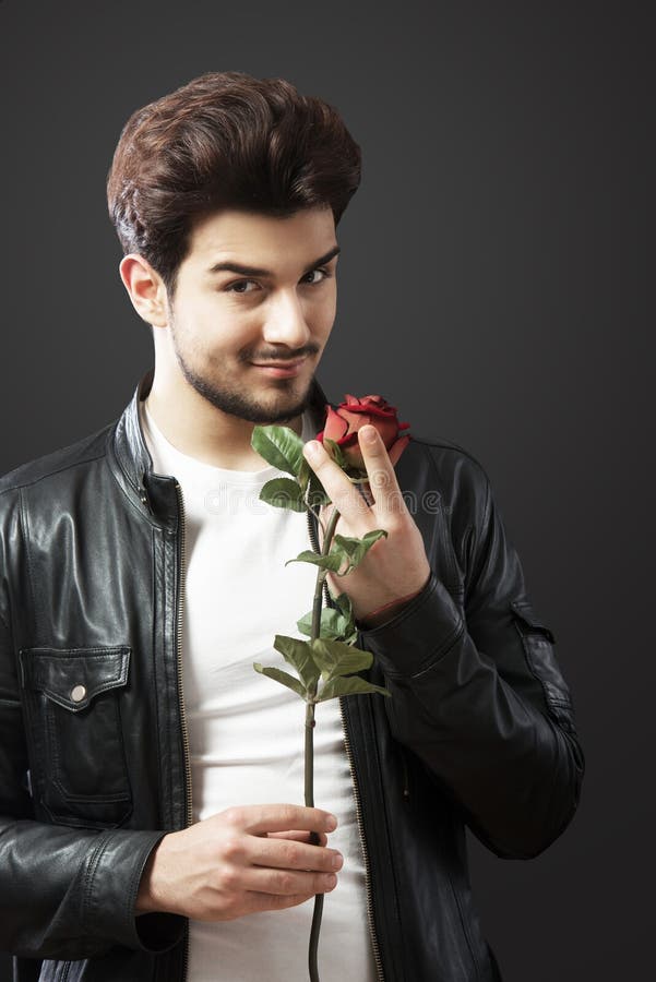 Guy with a red rose stock image. Image of declaration - 63397197