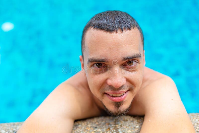 The Guy is Relaxing by the Pool on a Hot Summer Day Stock Photo - Image ...