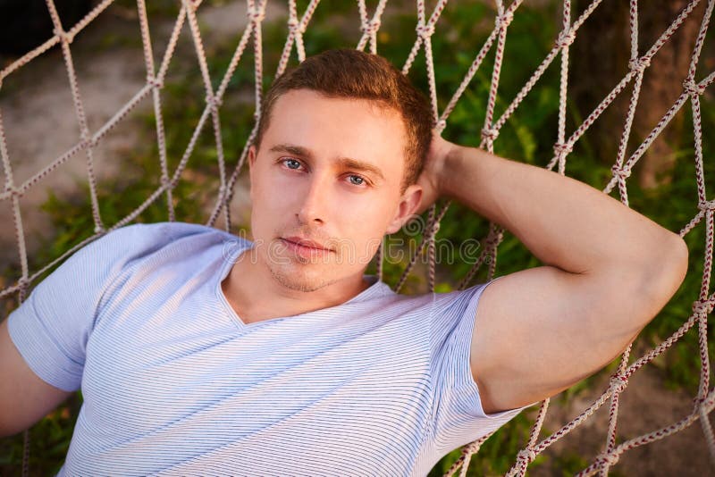 Guy Rest in Hammock Garden. Summer Vibes in Green Forest Stock Image ...