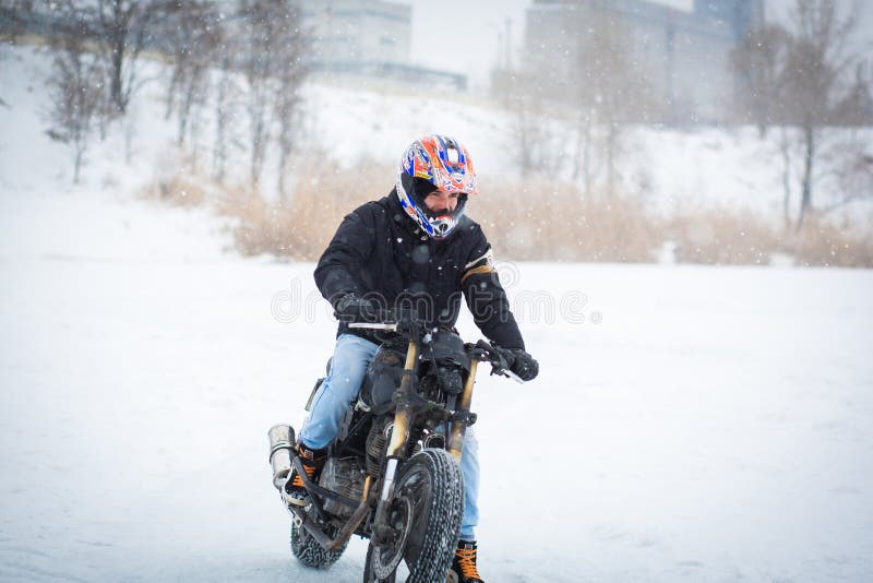 A Guy Rides a Motorcycle on a Frozen Lake Editorial Photography - Image ...