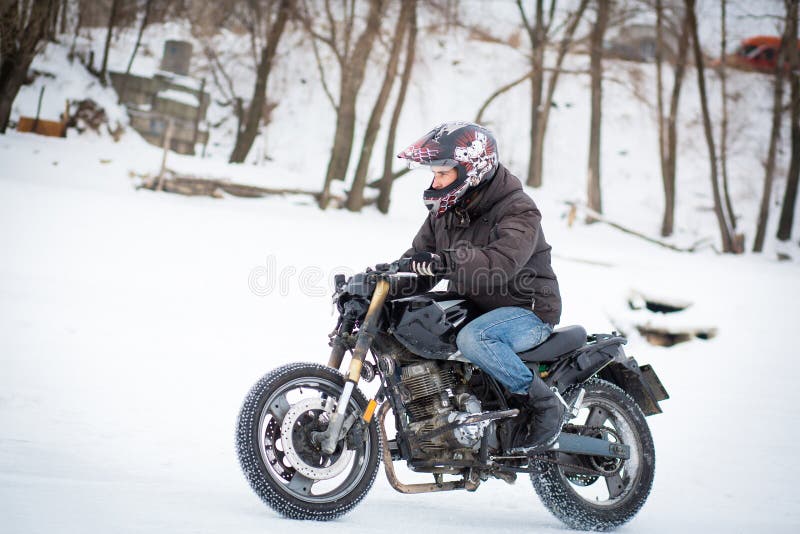 A Guy Rides a Motorcycle on a Frozen Lake Editorial Stock Image - Image ...