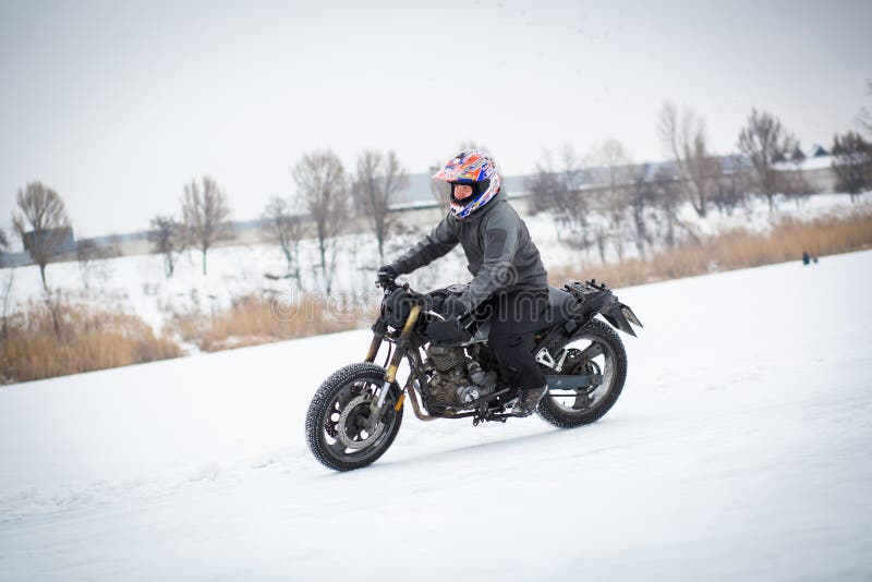A Guy Rides a Motorcycle on a Frozen Lake Editorial Image - Image of ...
