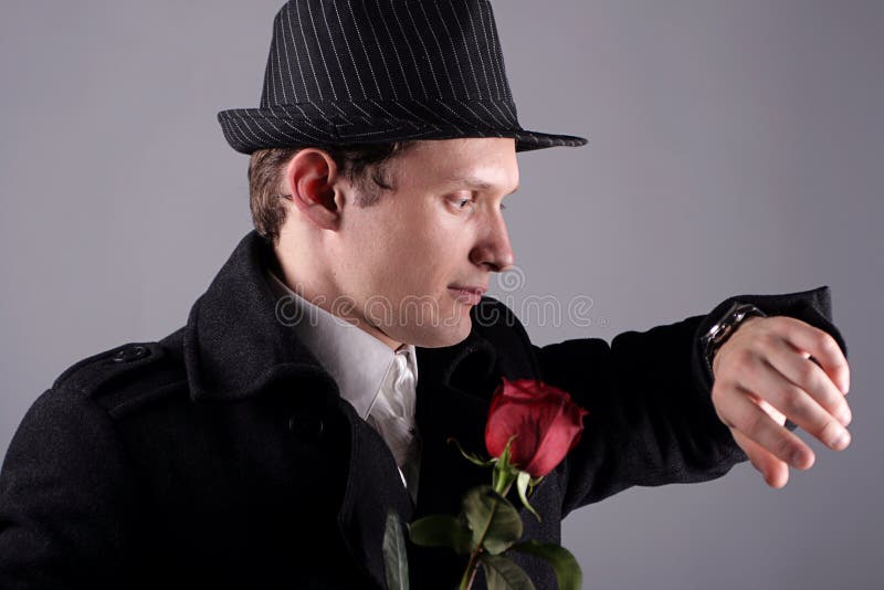 The Guy with a Rose Looks at Watch Stock Photo - Image of waiting ...