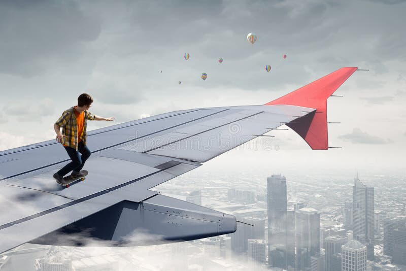 Guy Sakting on Airplane Wing Stock Photo - Image of sport, recreation ...