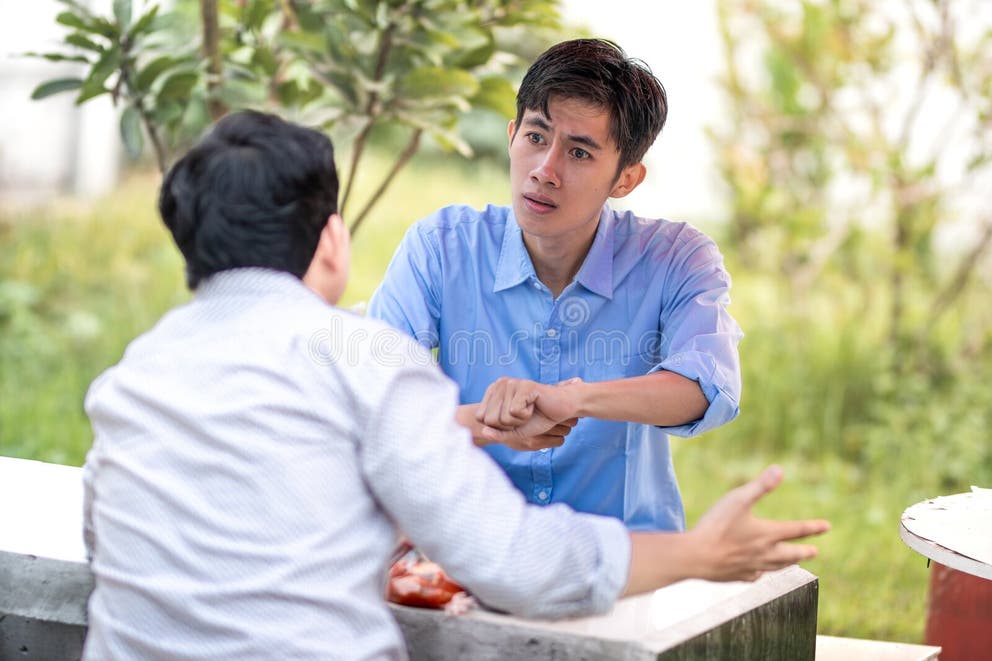 A Guy Scolds and Blames Someone for Being Late. Men Getting Scolded for ...