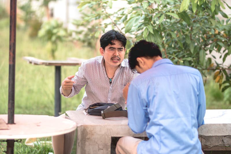 A Guy Scolds and Blames Someone for Messing Up. a Conflict or Dispute ...