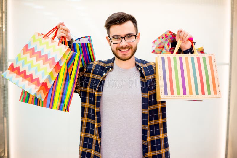 Guy shopping in a mall stock image. Image of consumer - 94691017