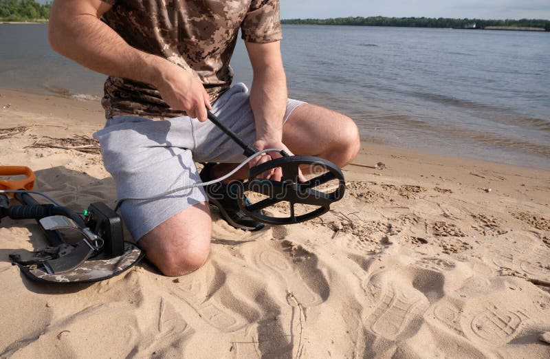 Guy on the Shore Getting Ready for a Treasure Hunt with a Metal ...