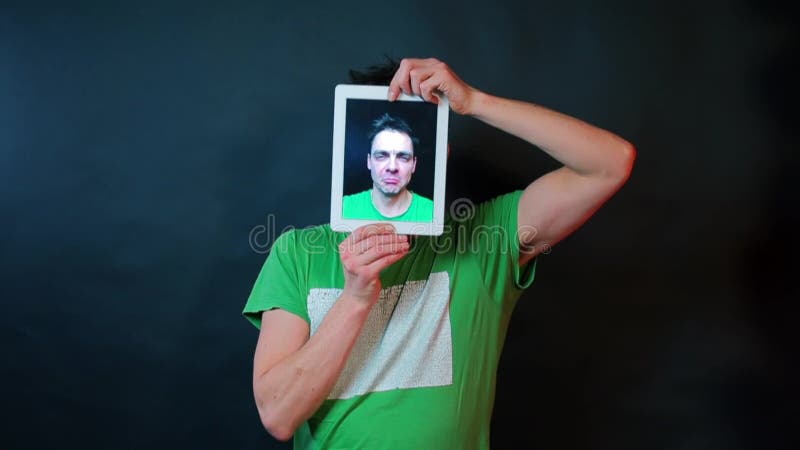 The Guy Shows His Face on the Tablet Screen. Stock Footage - Video of ...