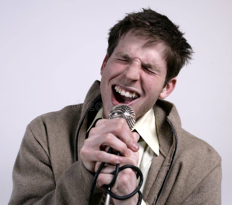 Guy singing stock image. Image of intense, microphone - 1820231