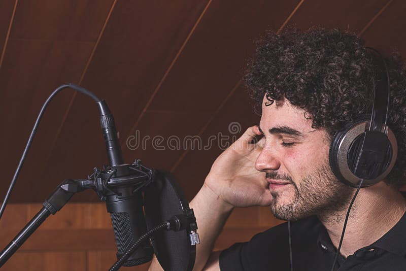 Guy Singing with a Microphone Stock Photo - Image of instrument, music ...