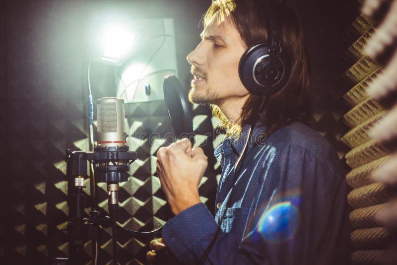 Man singing in the Studio stock photo. Image of audio - 94523480