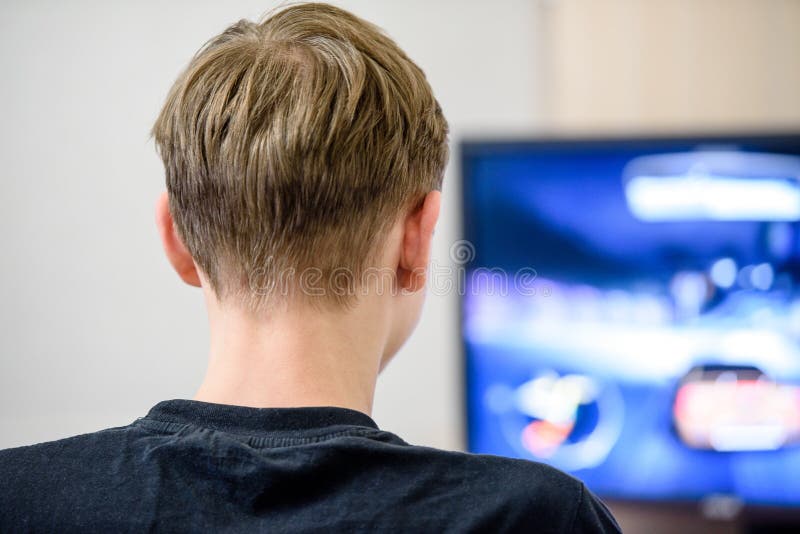 Guy Sitting at the Computer Playing a Game-view from the Back, Close-up ...