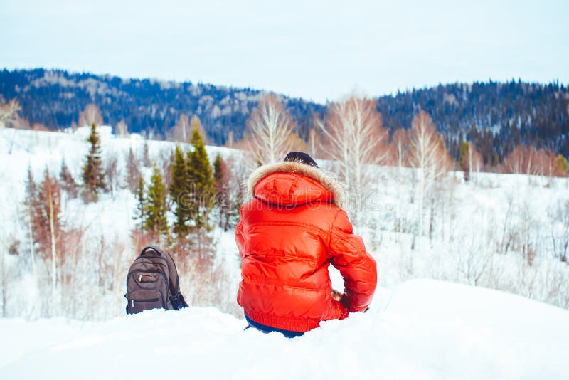 The Guy Sitting in the Snow Stock Photo - Image of lifestyle, person ...