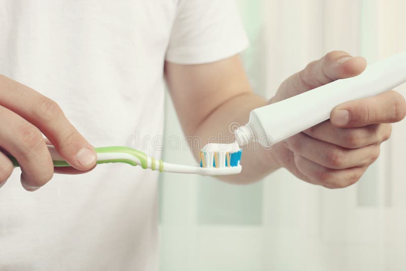 Toothpaste and toothbrush stock photo. Image of purity - 98876098