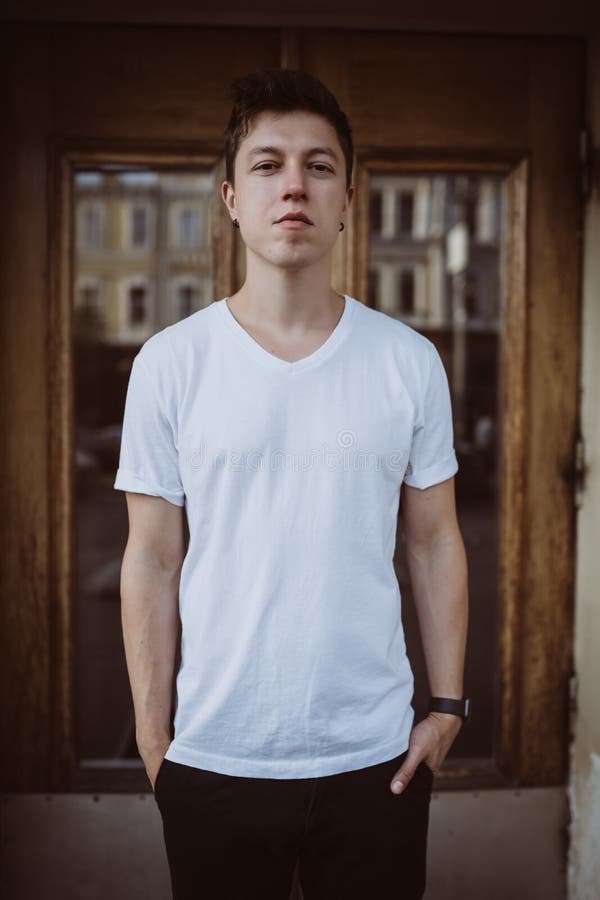 Guy Stand on the Background of the Building, Look Camera and Around ...