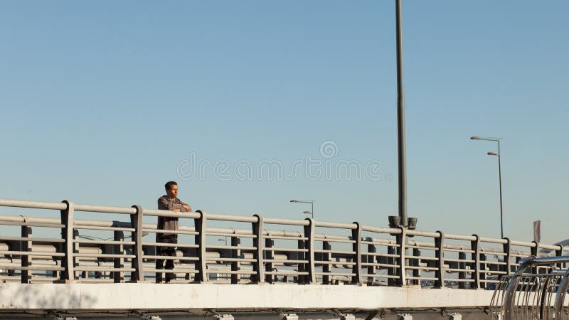 Guy Standing on Bridge and Enjoying Nature Stock Image - Image of ...