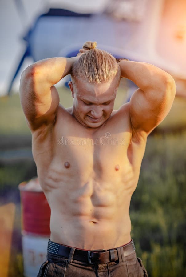 A Guy is Standing by the Plane. Stock Image - Image of nude, press ...