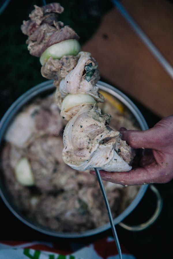 Guy Stringing Fresh Meat on a Skewer Stock Image - Image of cutting ...