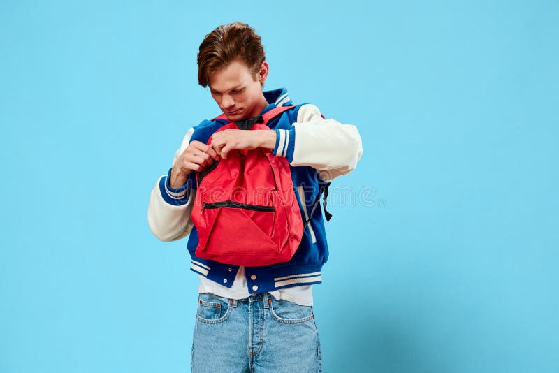 Guy Student with a Red Backpack Dressed Backwards Stock Photo - Image ...