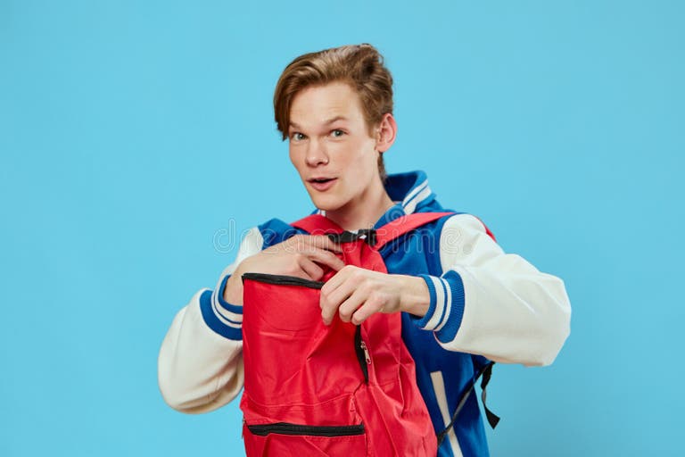 Guy Student with a Red Backpack Dressed Backwards Stock Photo - Image ...