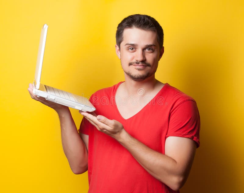 Guy in T-shirt with Laptop Computer Stock Photo - Image of laptop ...
