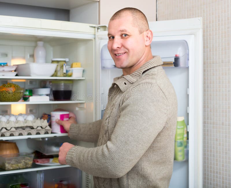 Guy Taking Food from Refrigerator Stock Photo - Image of human, white ...