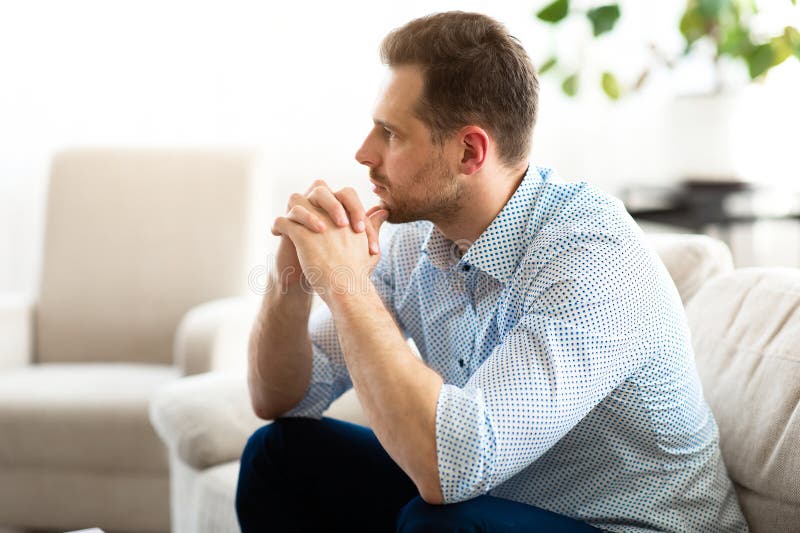 Guy Thinking at Home on the Sofa Stock Photo - Image of closeup, home ...