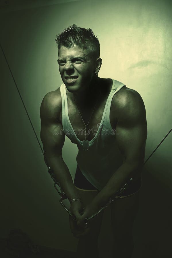 Guy Trains His Pecs Using Crossover Stock Photo - Image of healthcare ...