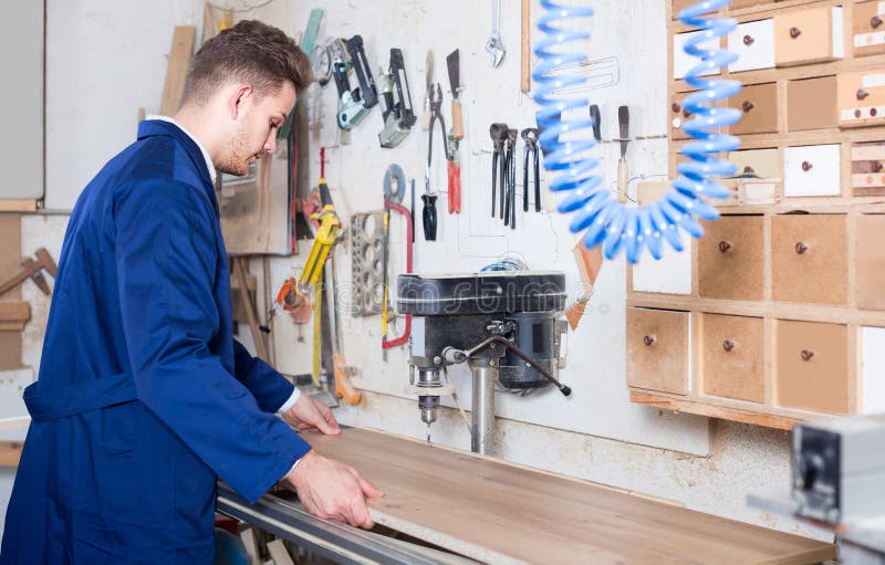 Guy Using Drilling Machine at Workshop Stock Photo - Image of shaping ...