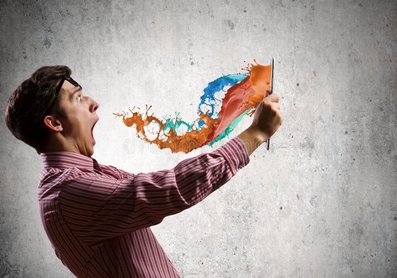 Guy using tablet pc stock photo. Image of expression - 41883590