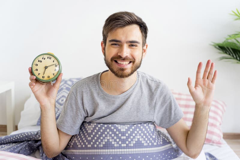 Guy is waking up stock image. Image of awake, bedroom - 100314653