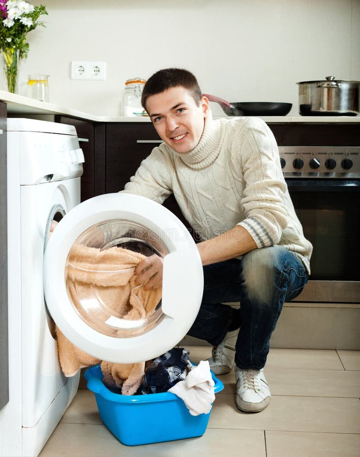 Guy with washing machine stock image. Image of machine - 40361091