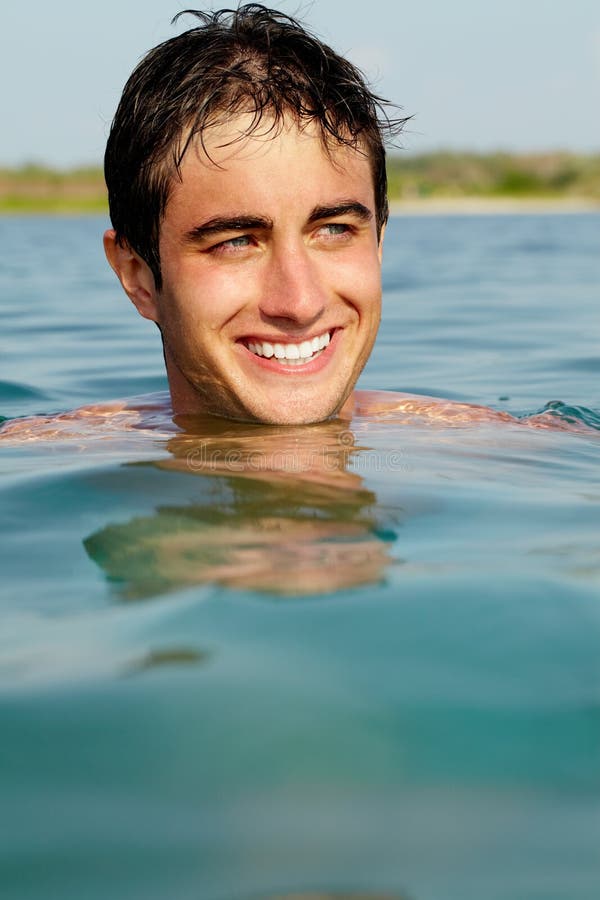 Guy in water stock image. Image of posing, people, male - 27379555