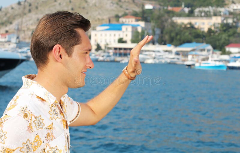 Guy Waving His Hand at Sea, Greeting Hello Stock Image - Image of eyes ...