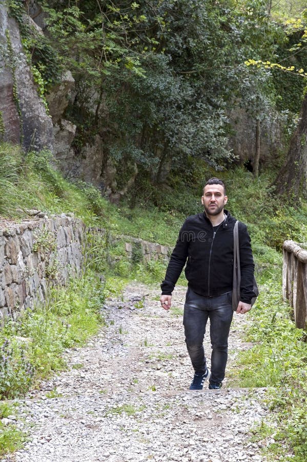 A guy who goes for a hike stock image. Image of cute - 162180639