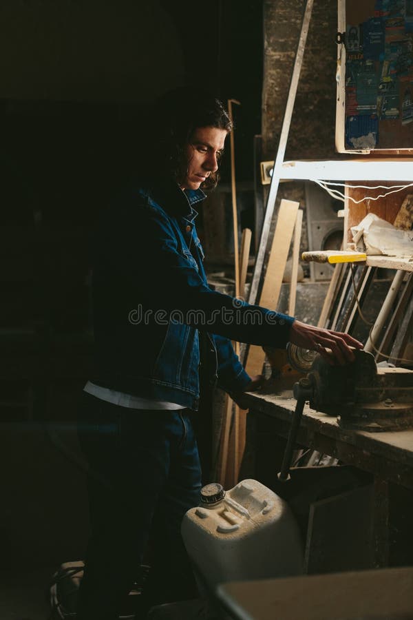 Guy Working at the Bench One Night Stock Photo - Image of lovely, light ...