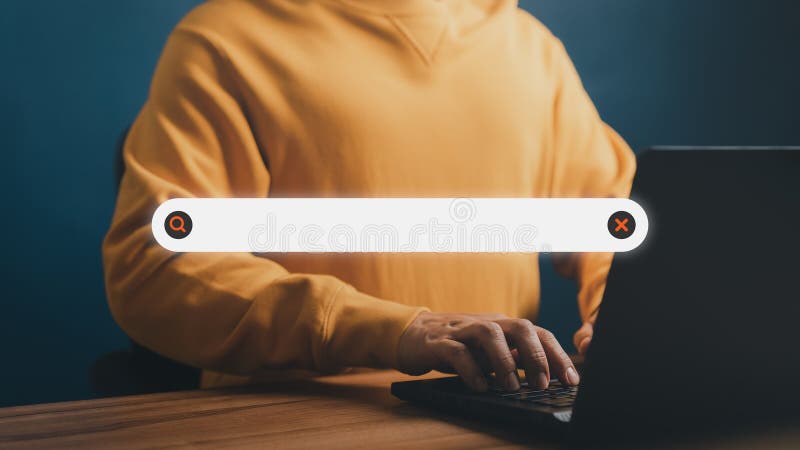 Guy Working with Laptop Computer on Table in Office. Search Engine ...