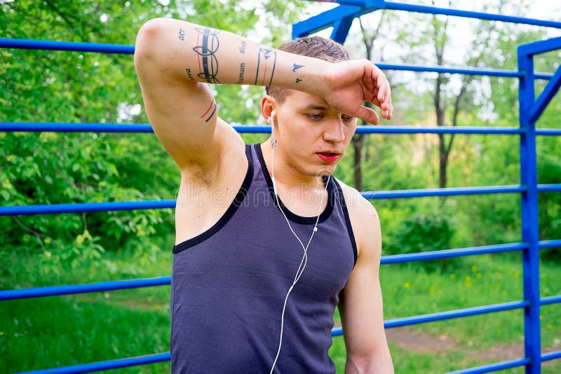 Guy working out outside stock photo. Image of power - 102398918