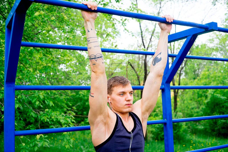 Guy working out outside stock photo. Image of person - 102399306