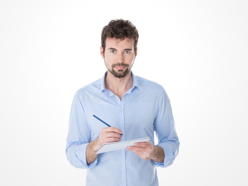 Guy Writing on an Exercise Book Stock Photo - Image of male, person ...