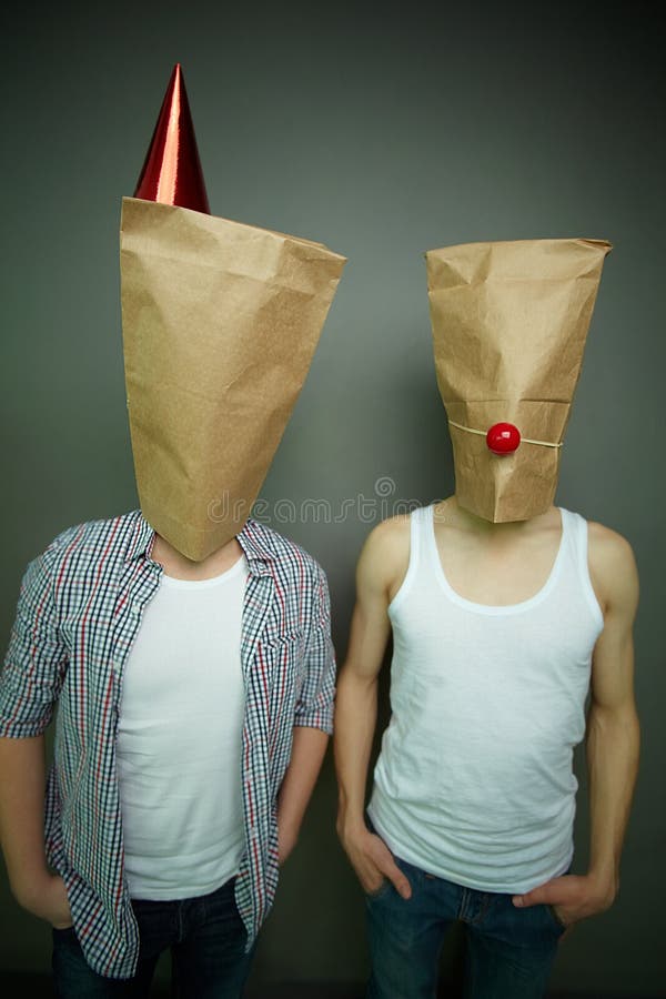Guys in paper bags stock image. Image of friendship, cone - 26269213