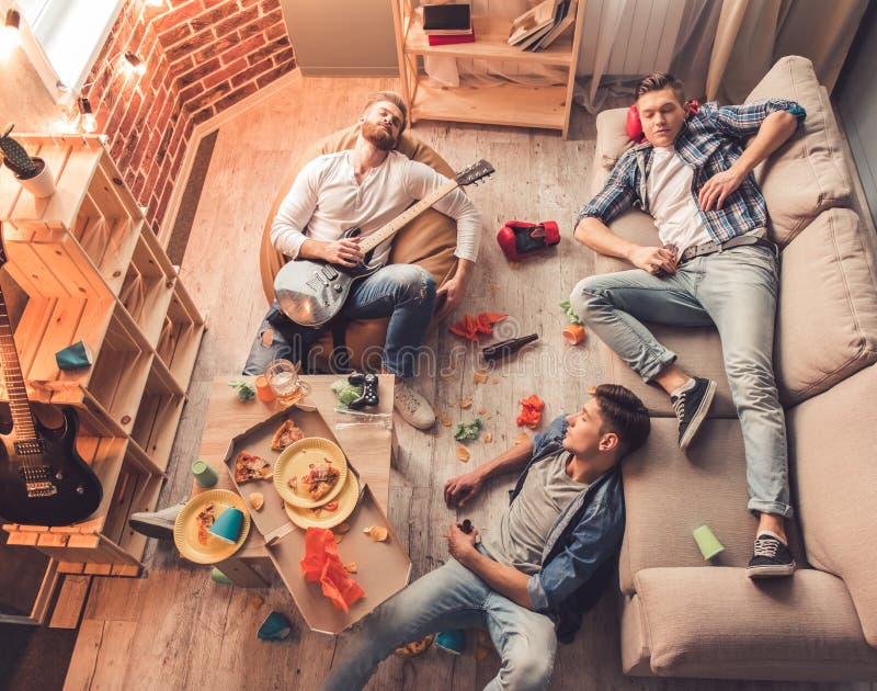 Guys after the party stock image. Image of drunk, mess - 84765883