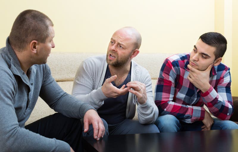Guys Sharing Problems at the Table Stock Photo - Image of sadness ...